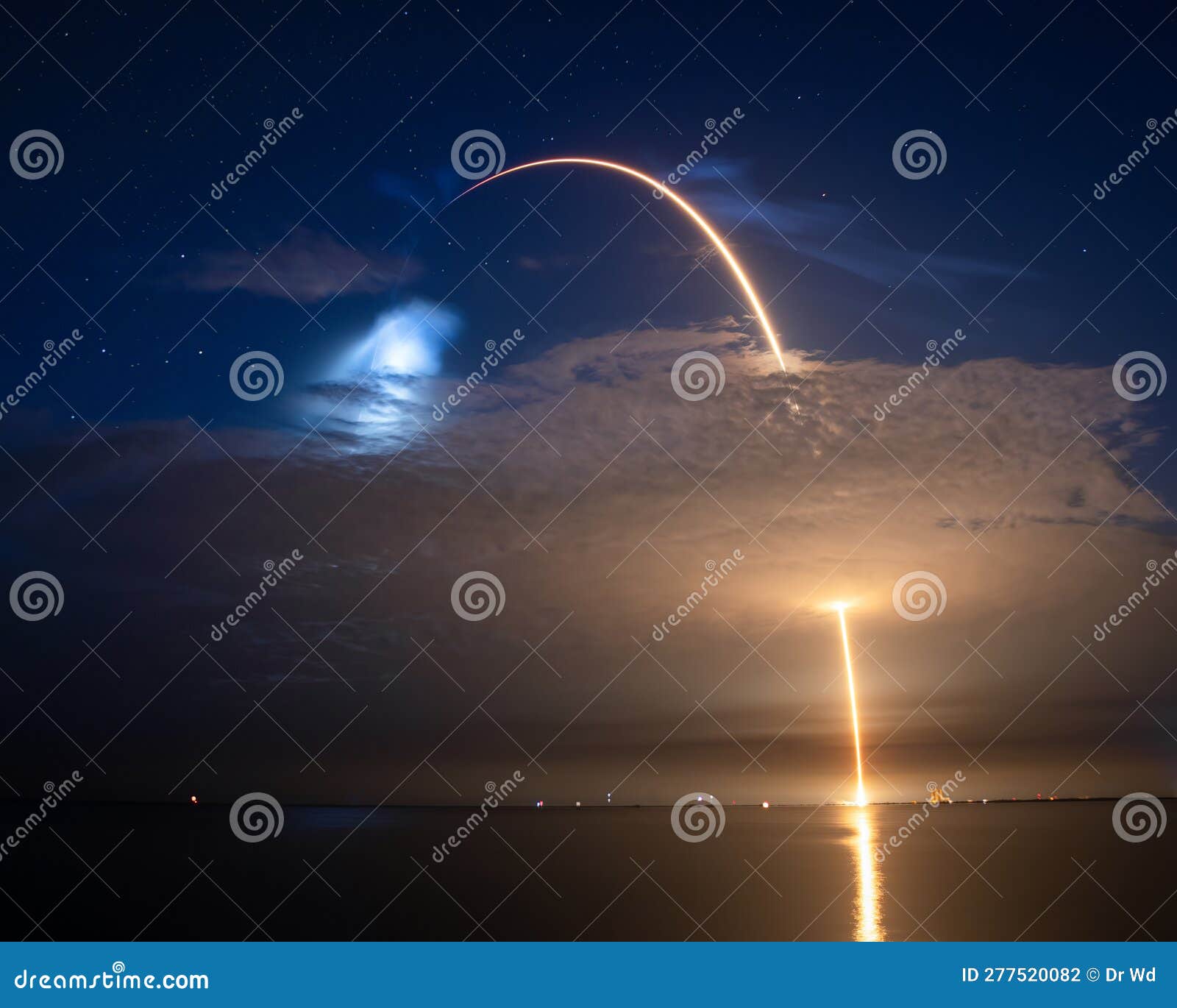 A Rocket Launch Streaks into a Starry Night Stock Photo - Image of ...