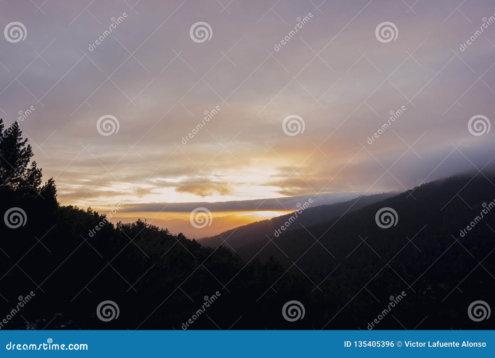 Stunning Sunset between Mountains Stock Photo - Image of orange ...