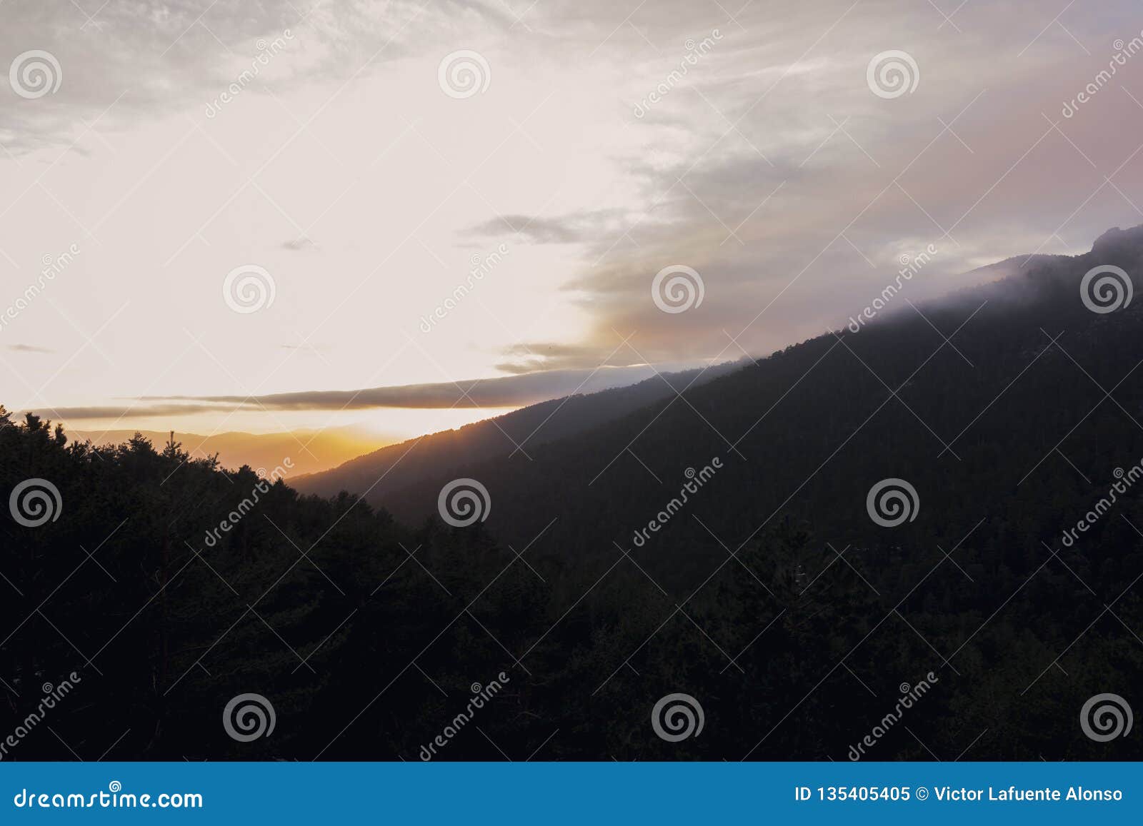 Stunning Sunset between Mountains Stock Image - Image of scene, horizon ...