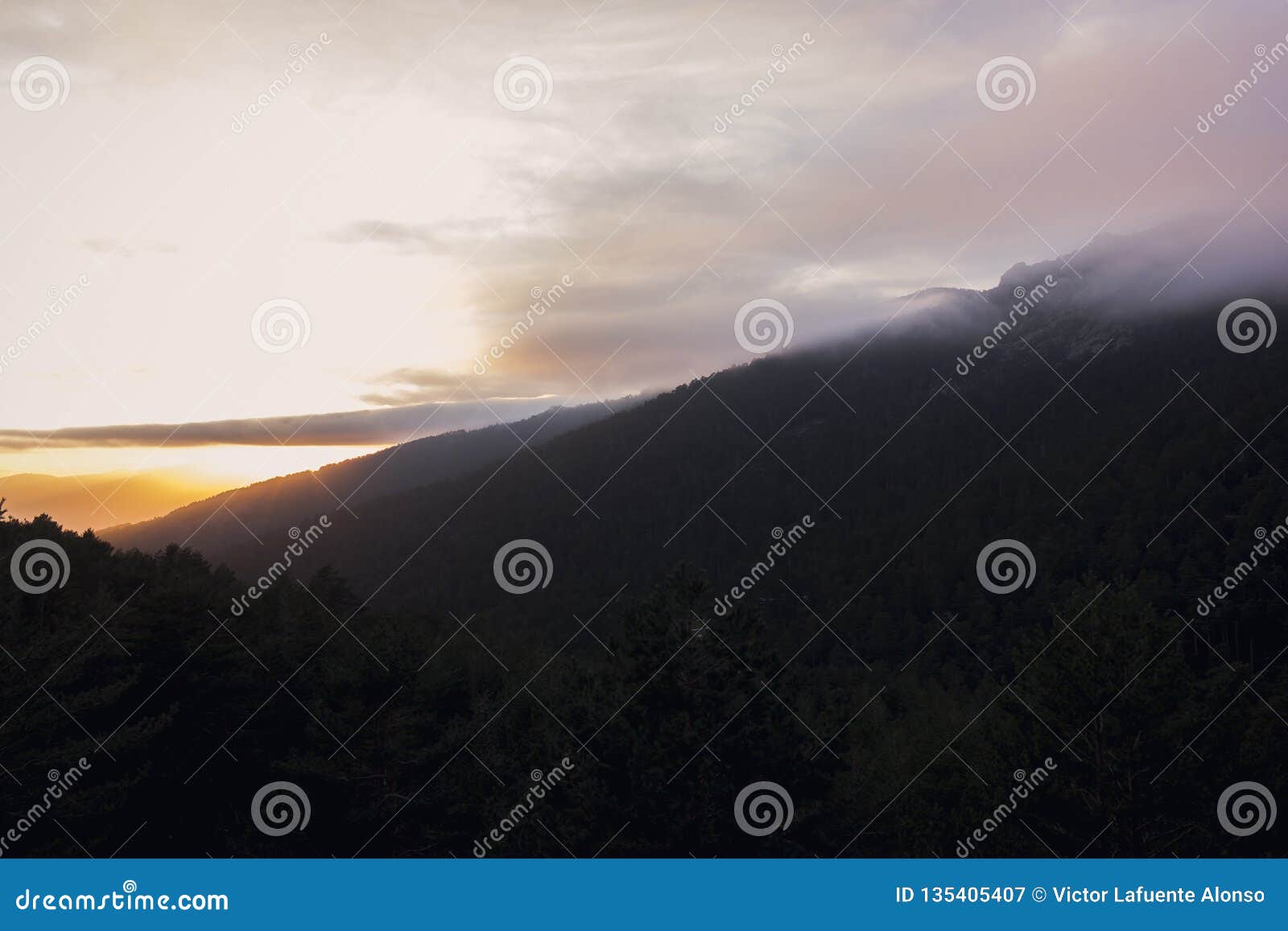 Stunning Sunset between Mountains Stock Image - Image of land, idyllic ...
