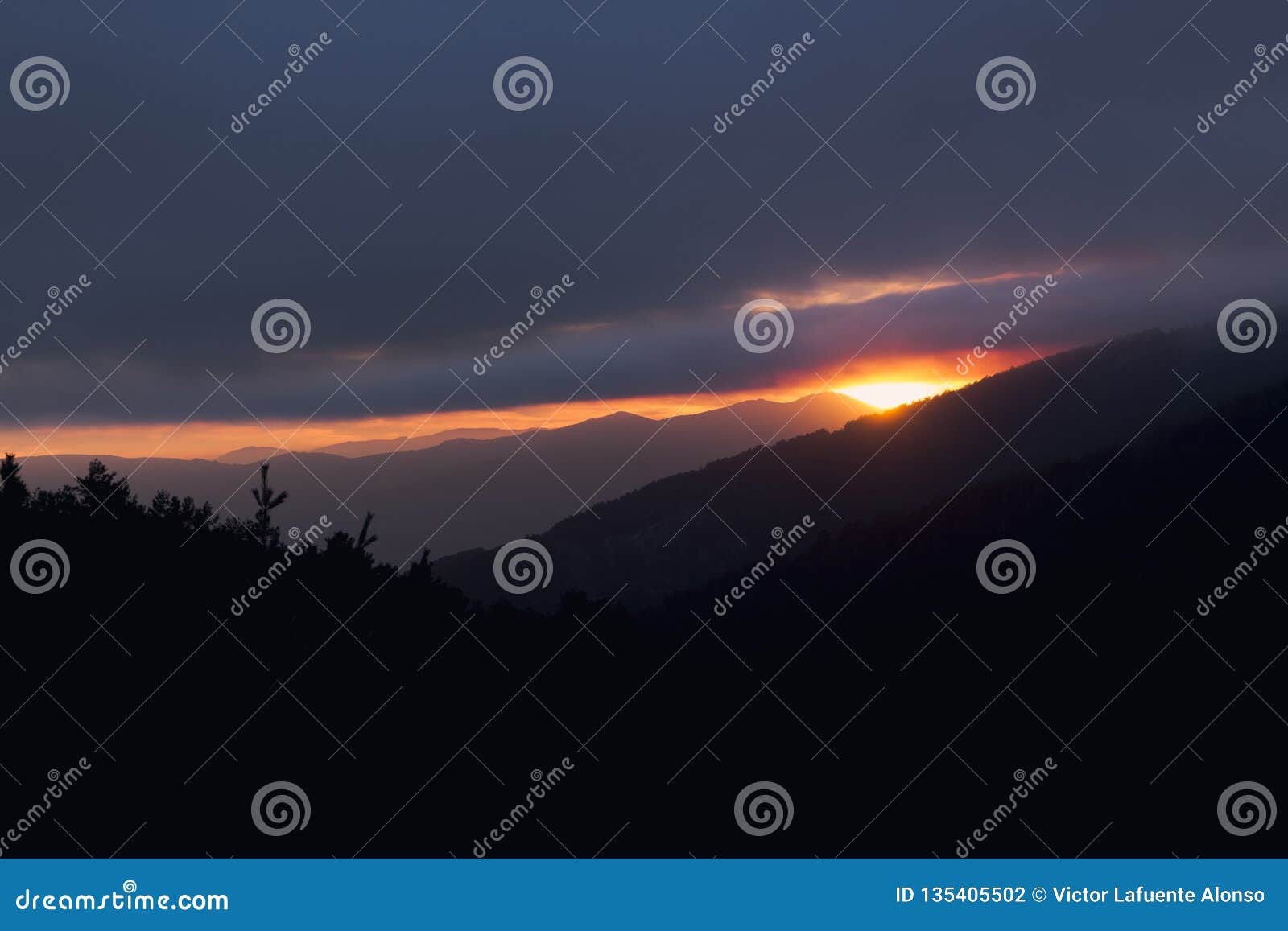 Stunning Sunset between Mountains Stock Photo - Image of country ...