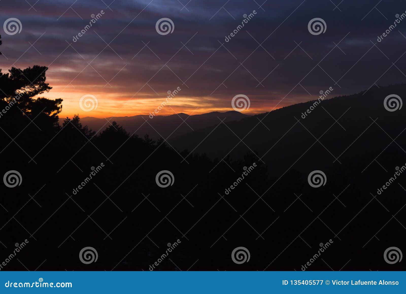 Stunning Sunset between Mountains Stock Image - Image of natural, land ...