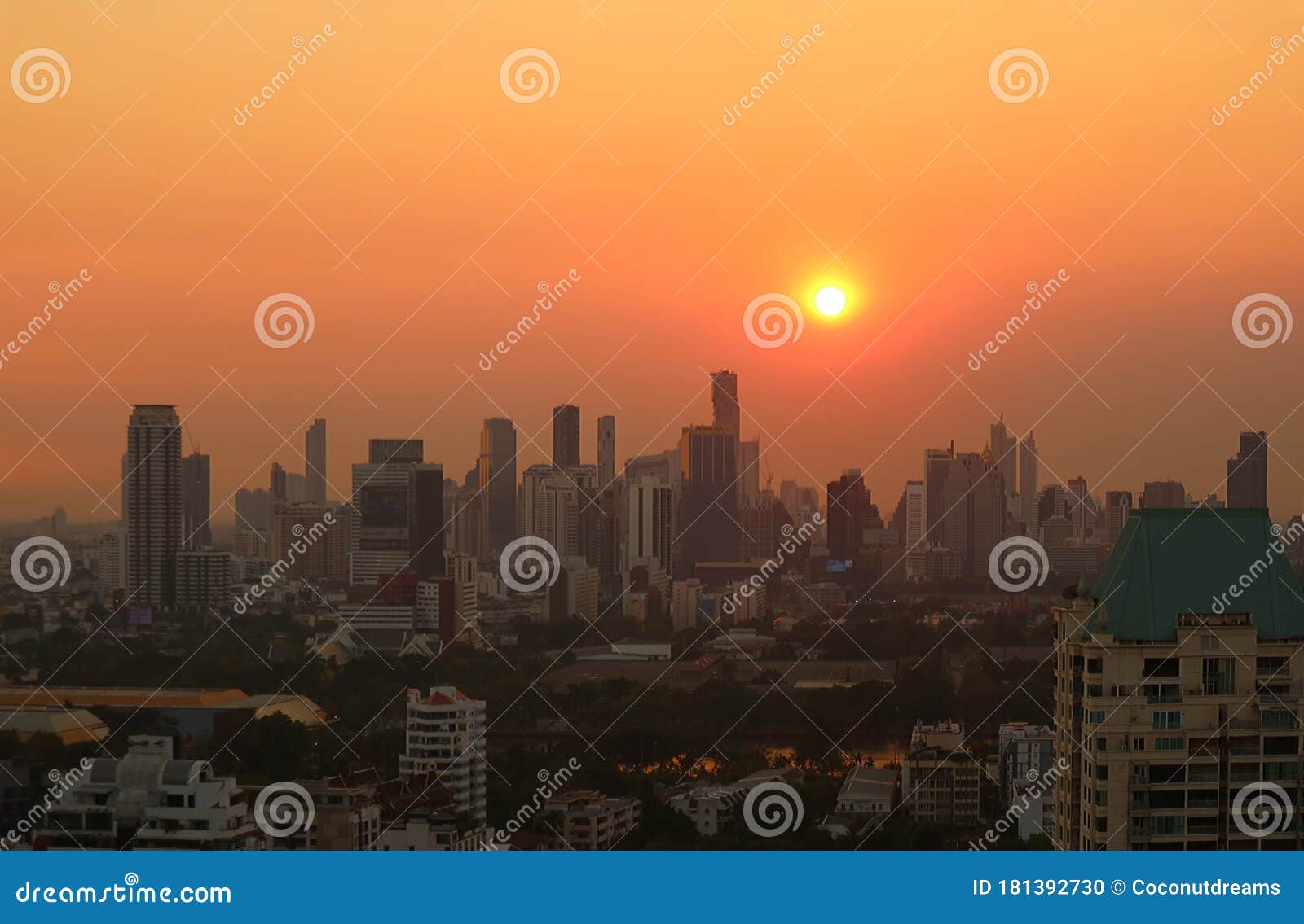 Stunning View of the Bright Sun Setting Over the City Stock Photo ...