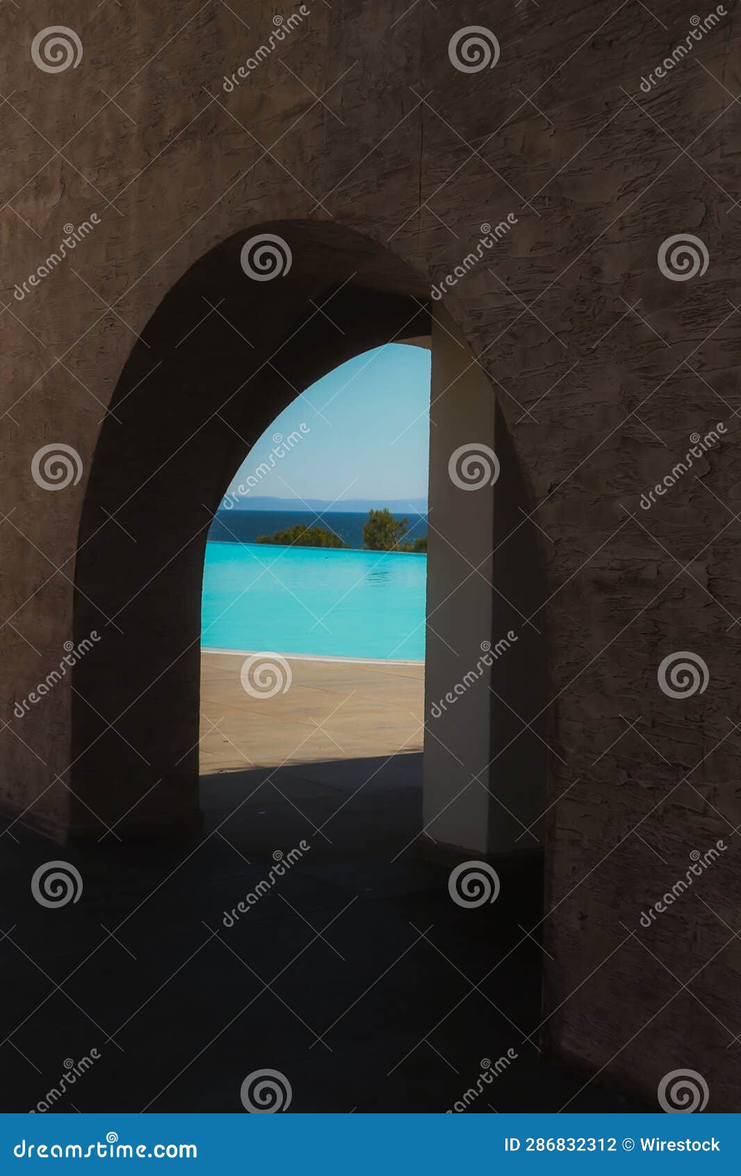 Stunning View from Inside an Arched Window Looking Down Onto a Pool ...
