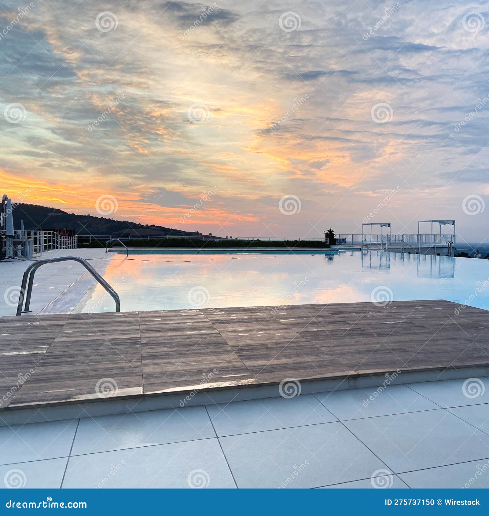 Stunning View of a Pool Reflecting the Mesmerizing Sunset Stock Photo ...