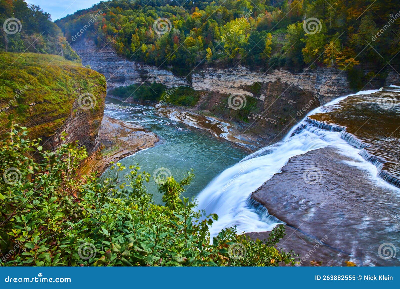 Stunning Waterfall on Edge Pouring into Huge Canyon with Cliffs and ...