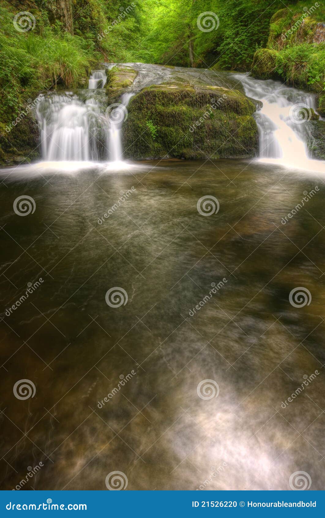 Stunning Waterfall Flowing Over Rocks in Forest Stock Photo - Image of ...