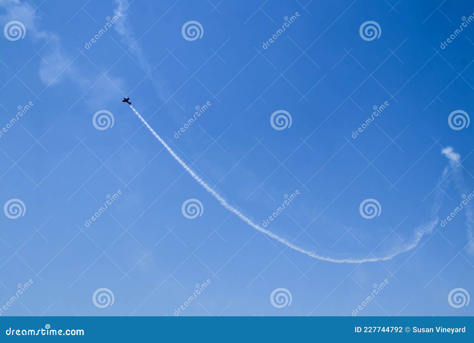 Stunt Plane Doing Loops Very Blue Sky with White Smoke Trail Stock ...