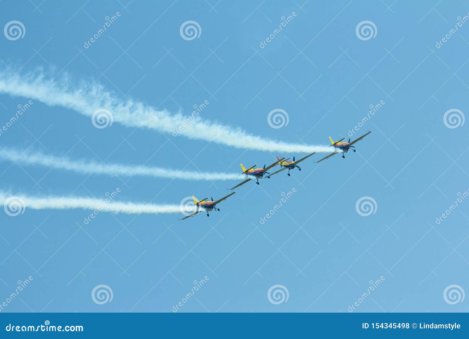 Stunt Plane Flying Against Clear Blue Sky. Editorial Stock Photo ...