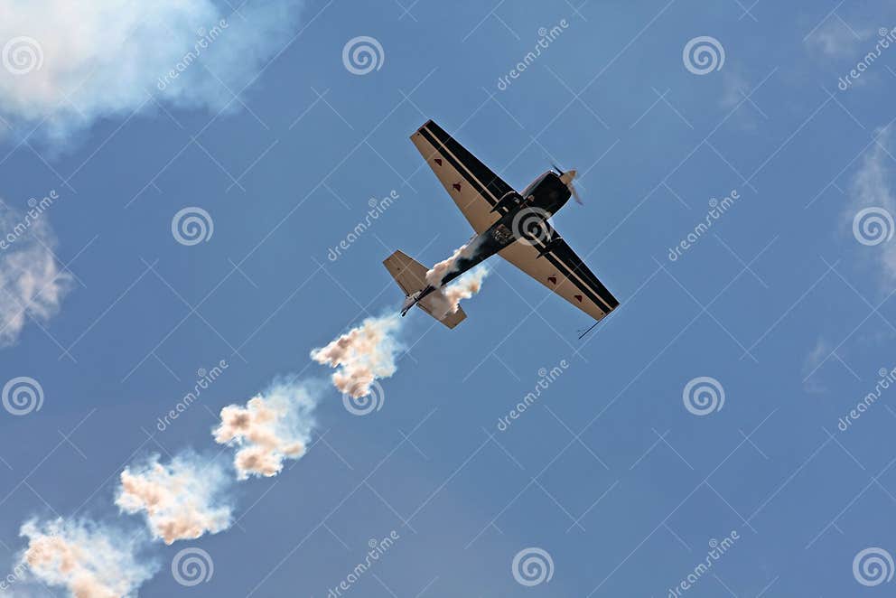 Stunt plane soars in air stock photo. Image of engine - 9699662