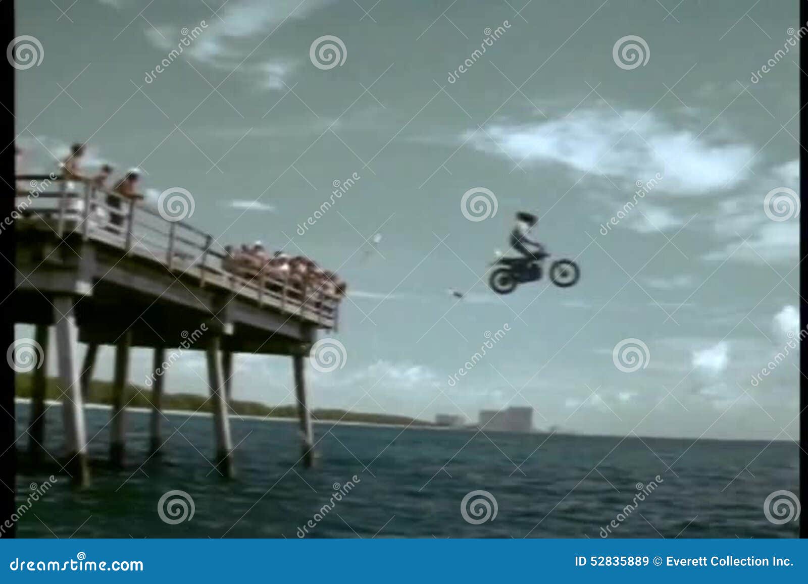 Stuntman Driving Motorcycle Off Pier into Ocean Stock Video - Video of ...