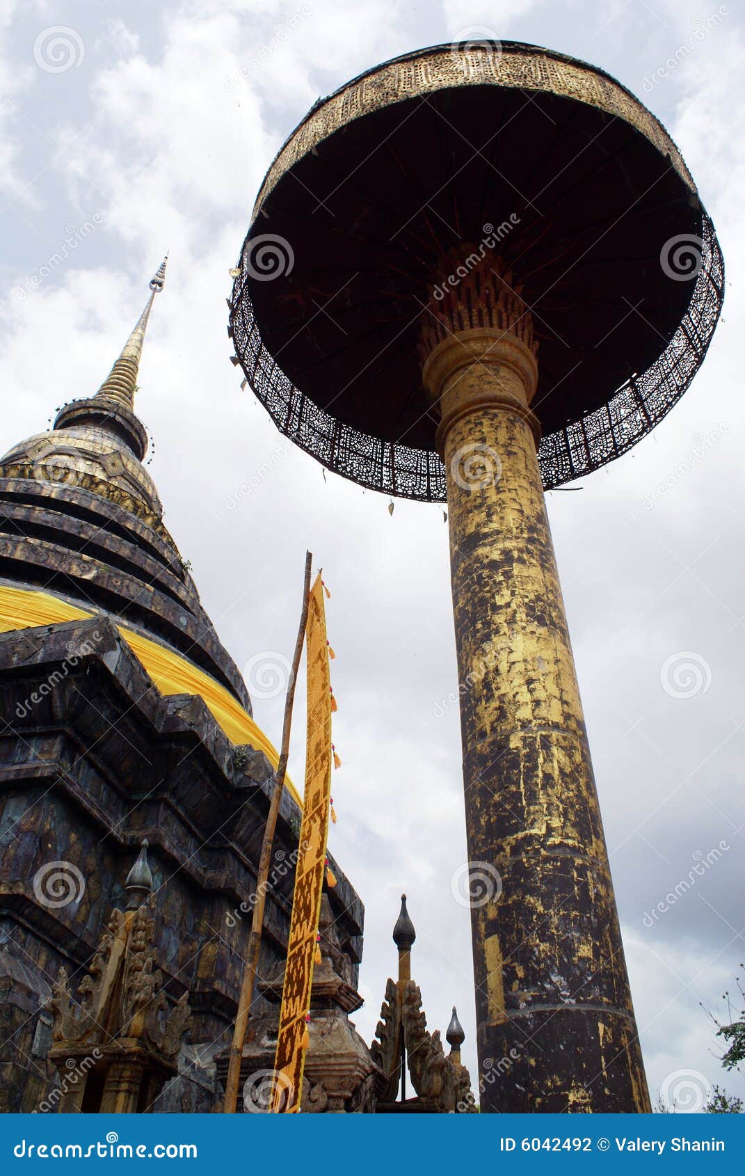 Stupa and big umbrella stock photo. Image of building - 6042492