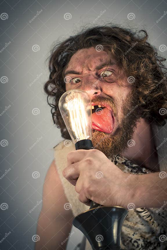 Stupid Caveman Lightbulb stock image. Image of crazy - 69060903