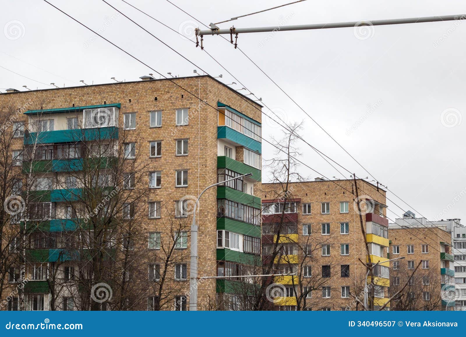 A Sturdy Brick Building Featuring a Balcony Adorning Its Top Section ...