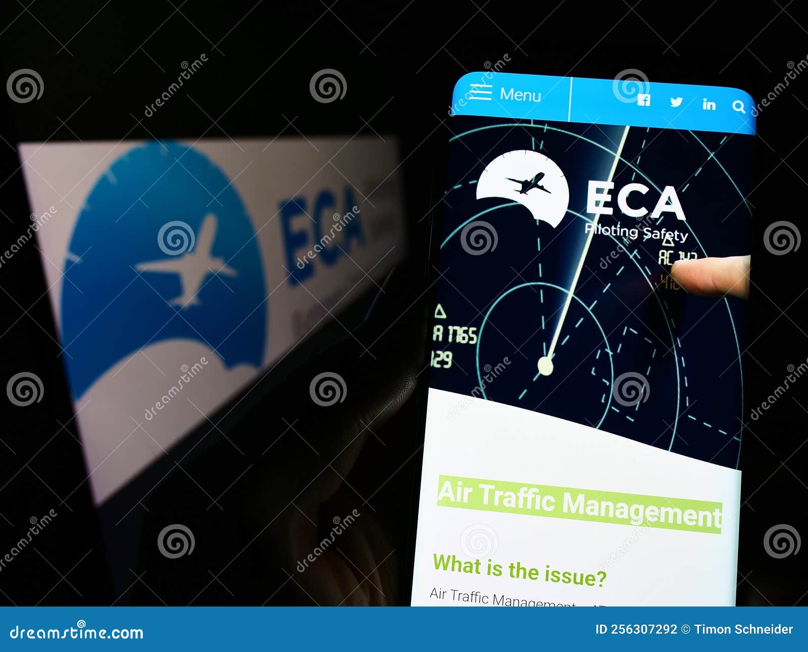 Person Holding Mobile Phone with Website of Organization European ... Person Holding Mobile Phone with Website of Organization European ...