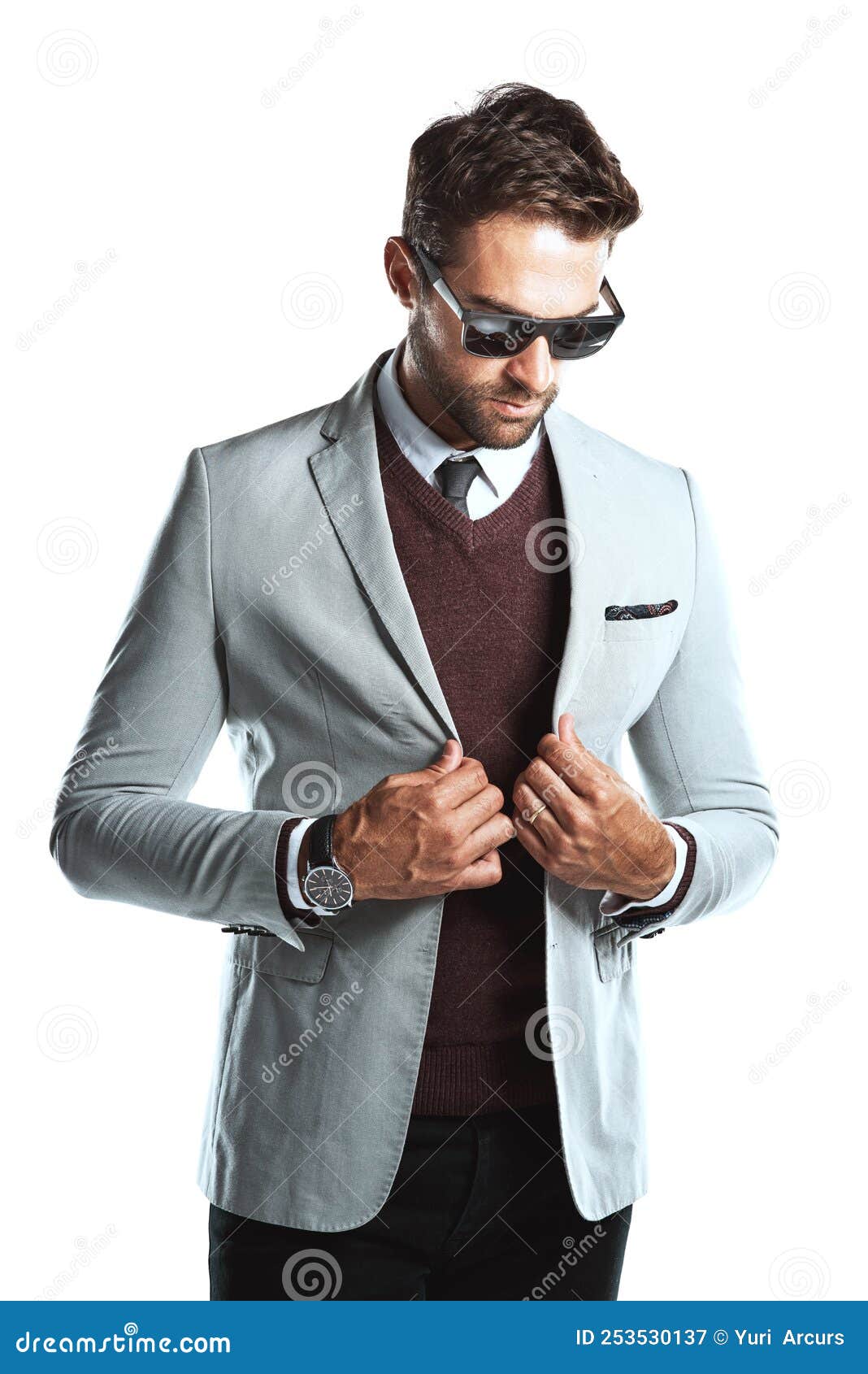 The Style Savvy Man. Studio Shot of a Handsome Young Man Posing Against ...