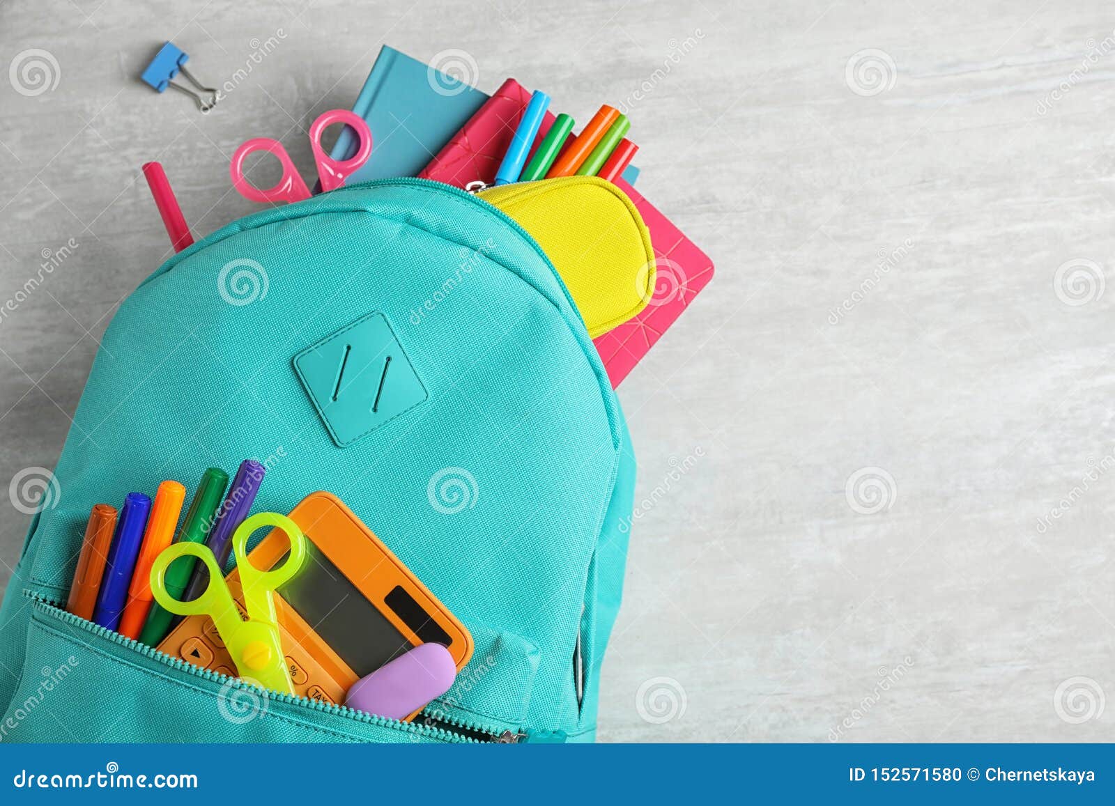 Stylish Backpack with Different School Stationary on White Table, Top ...