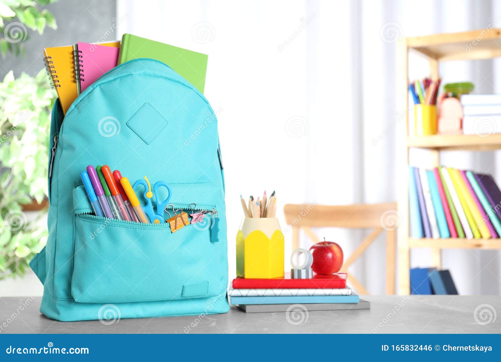 Stylish Backpack with Different School Stationery on Table. Space for ...