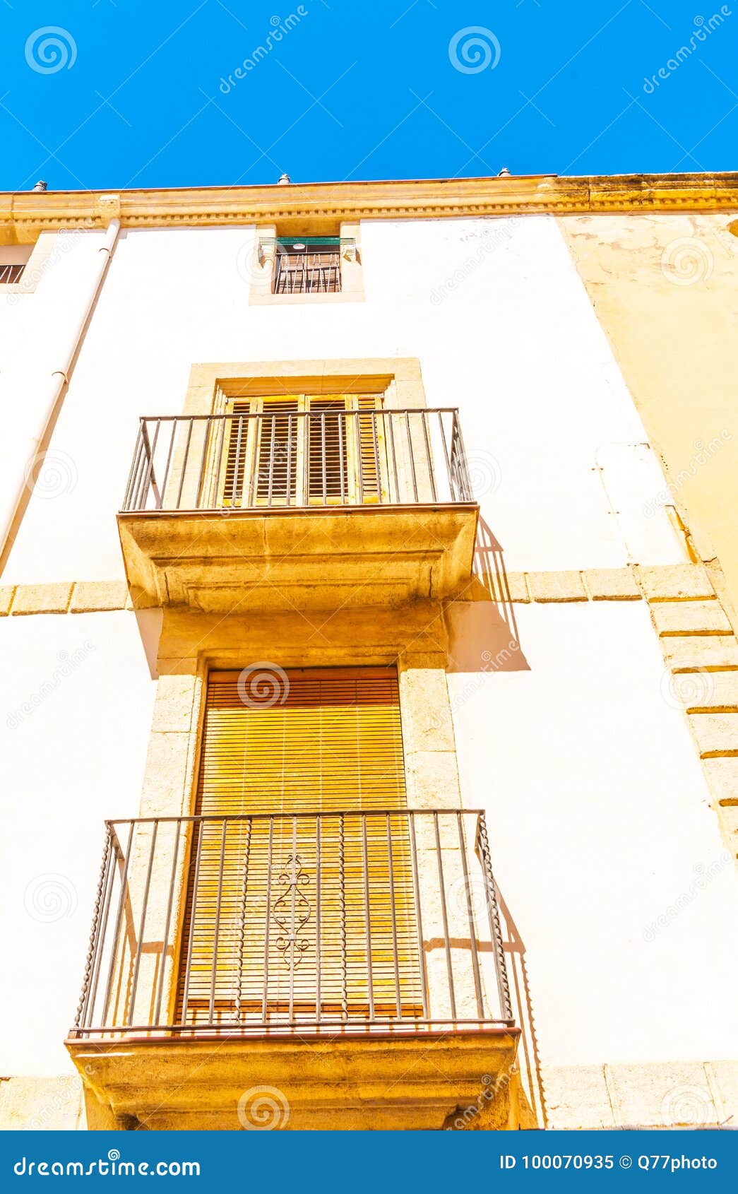 Stylish Balcony with a Metal Railing, Solid Architectural Element, a ...