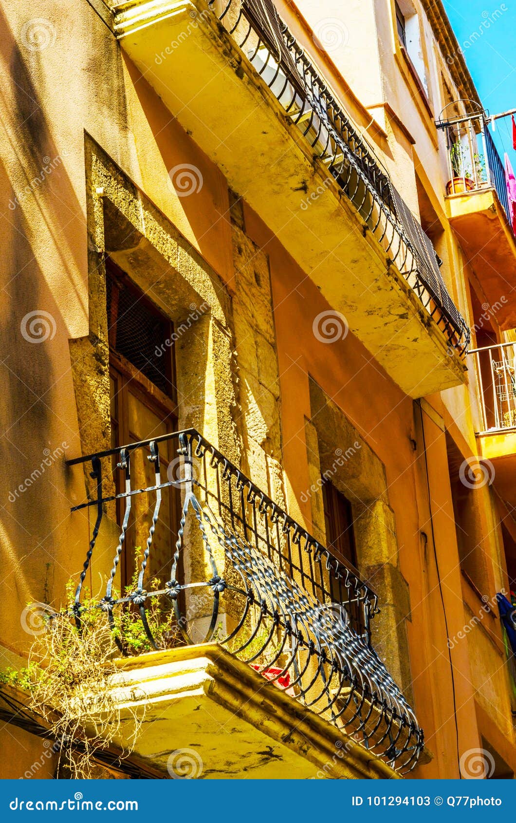 Stylish Balcony with a Metal Railing, Solid Architectural Element, a ...