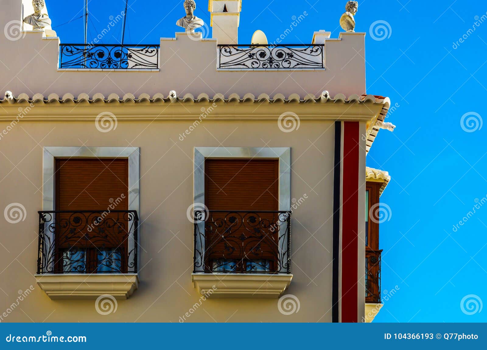 Stylish Balcony with a Metal Railing, Solid Architectural Element, a ...