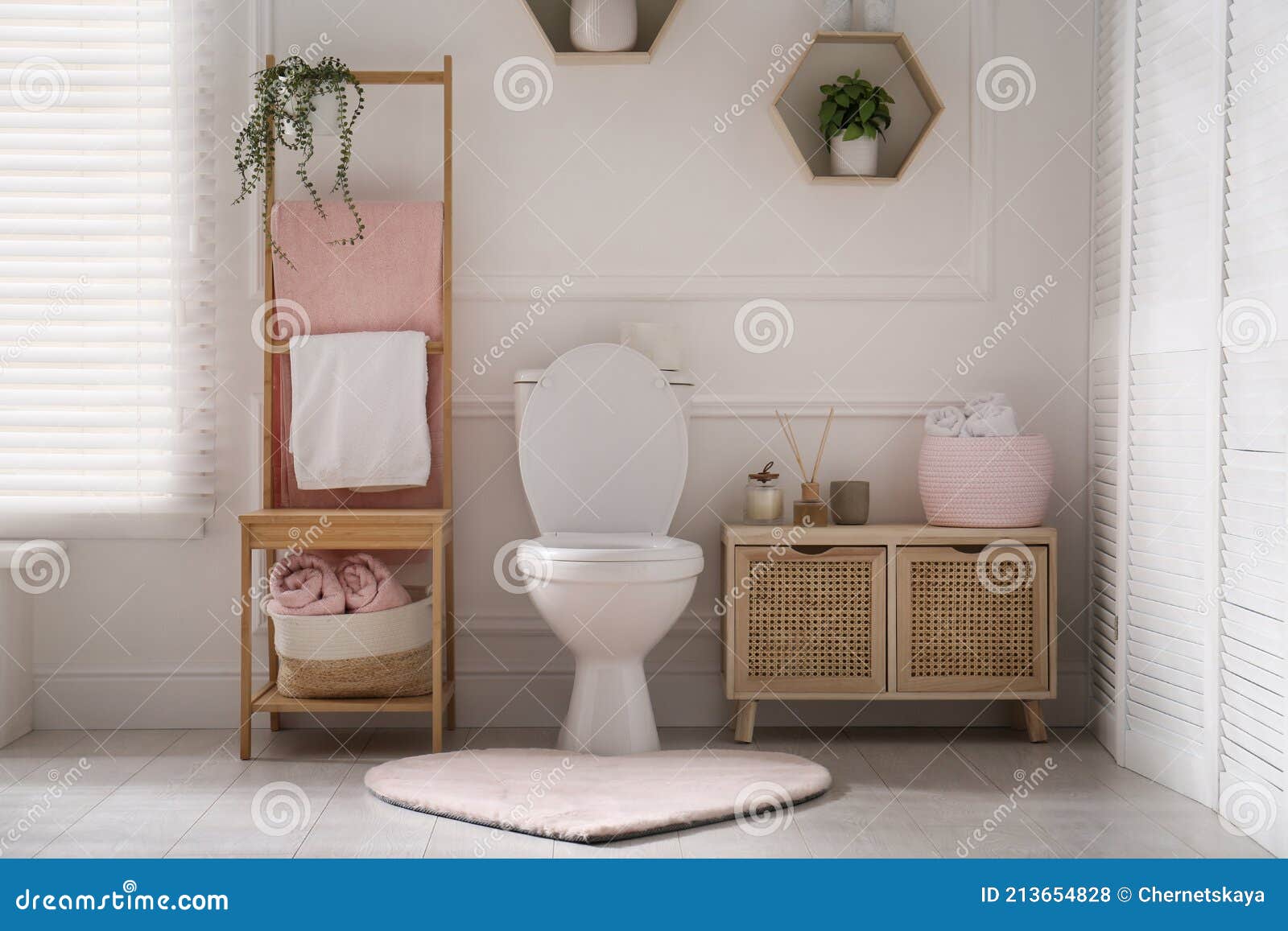 Stylish Bathroom Interior with Toilet Bowl and Other Essentials Stock ...