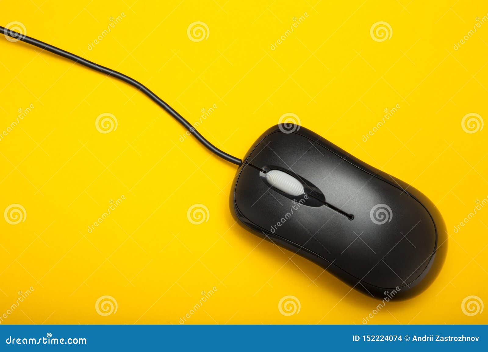 Stylish Black Optical Computer Mouse Isolated on a Yellow Background ...