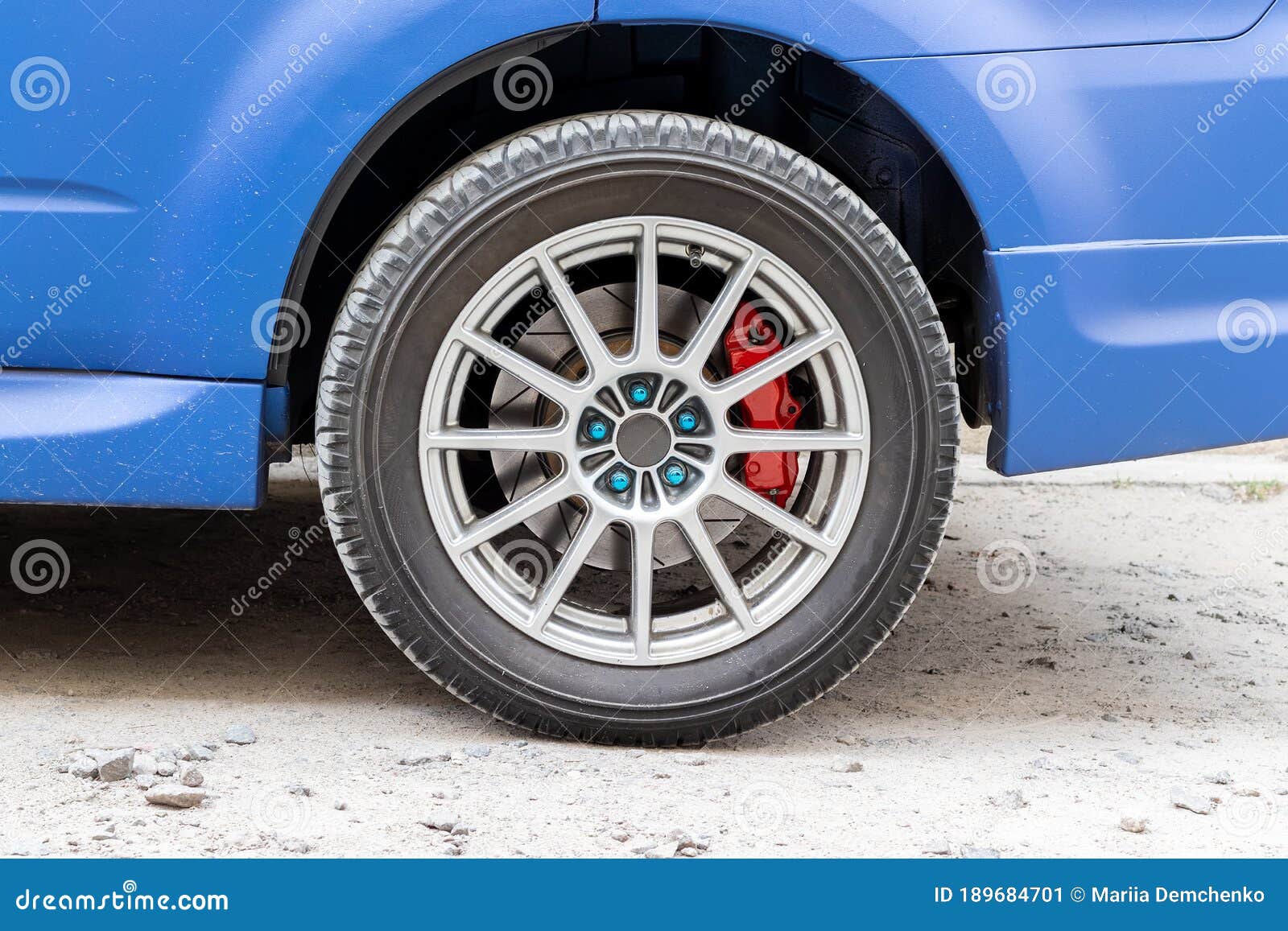 Stylish Blue Car Wheel with Red Brake Caliper and Five-nut Rim. Brake ...