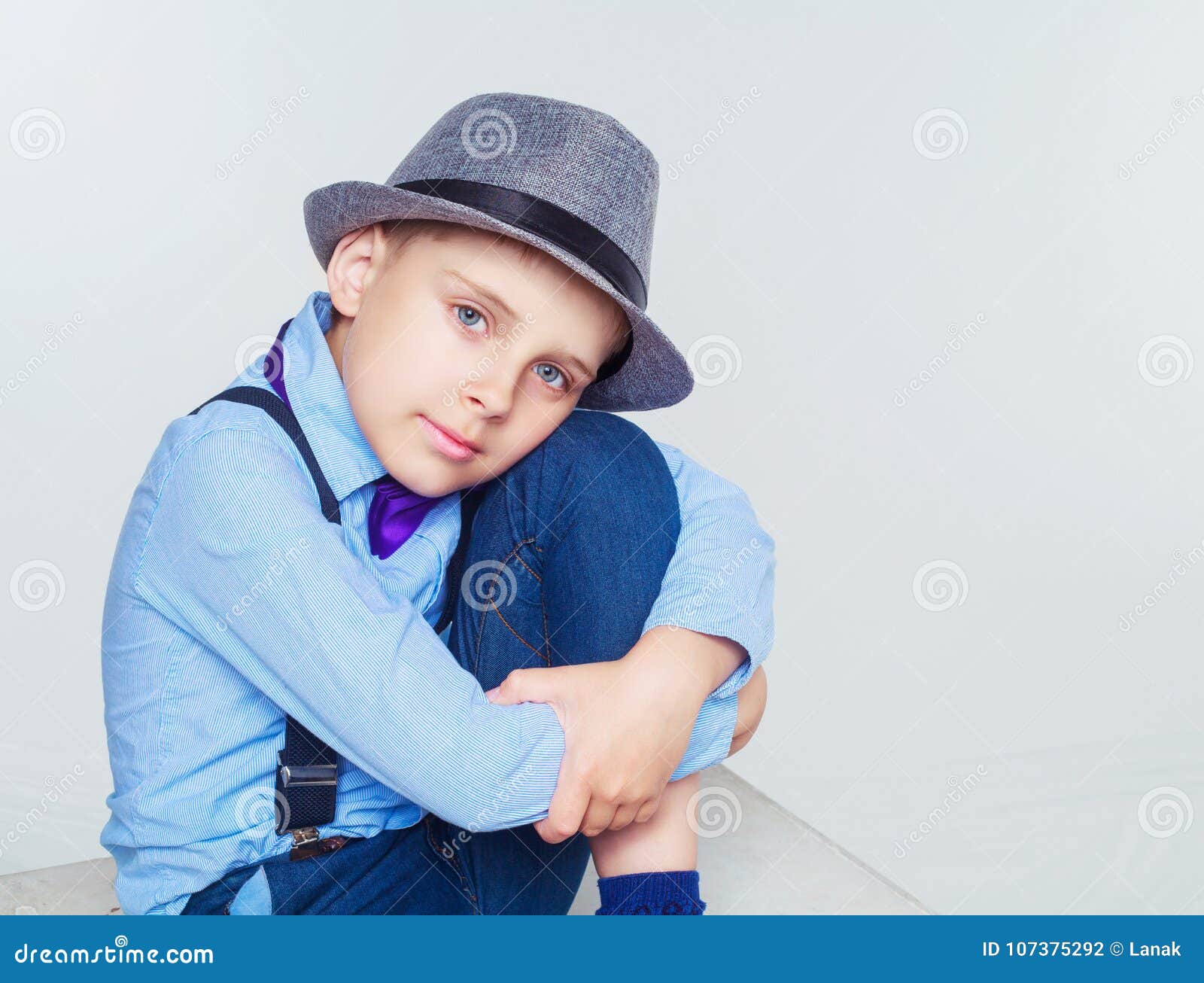 Stylish boy wearing a hat stock photo. Image of classic - 107375292