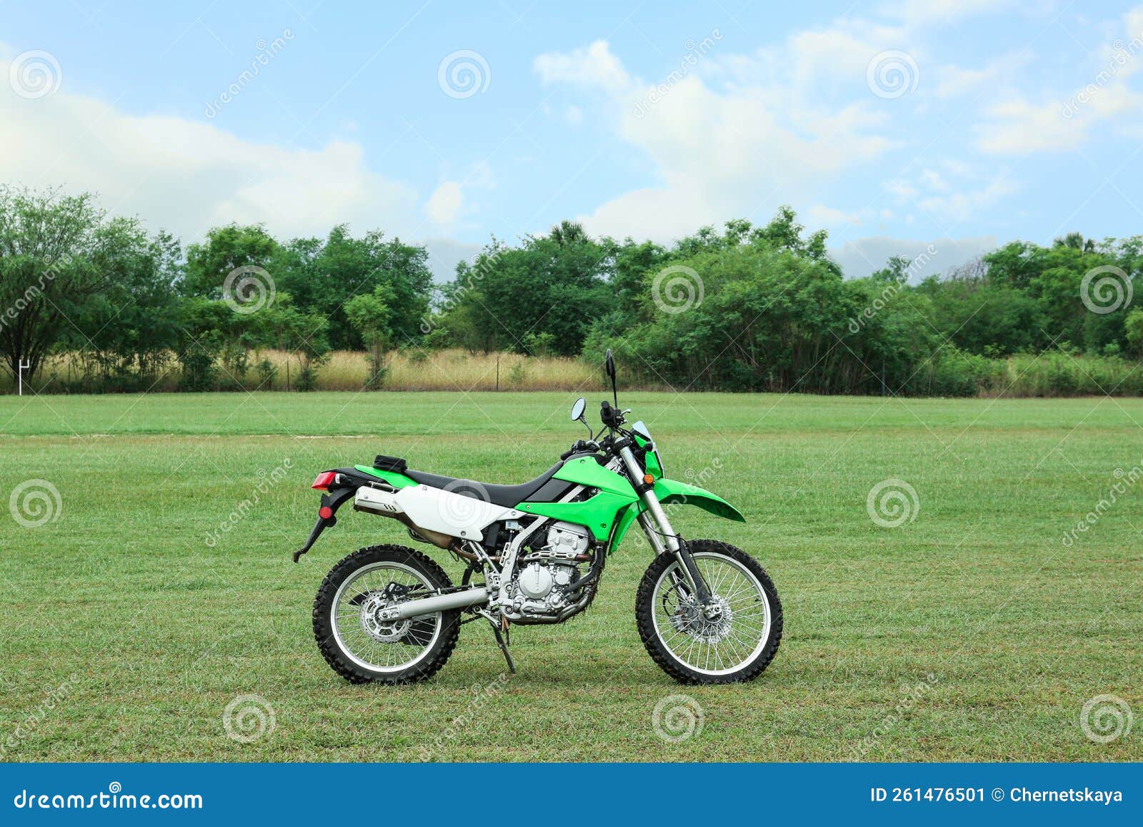 Stylish Cross Motorcycle on Green Grass Outdoors Stock Image - Image of ...