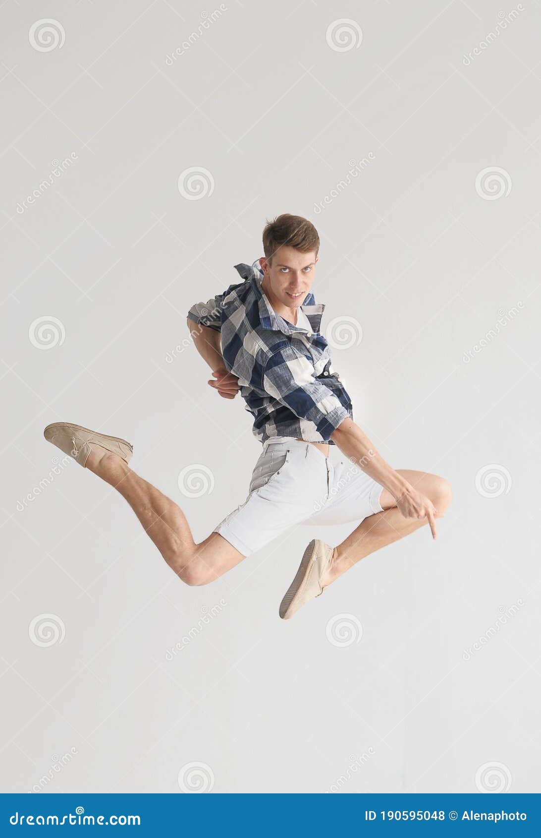 Stylish Dancer Man Jumping in Studio Stock Photo - Image of casual ...