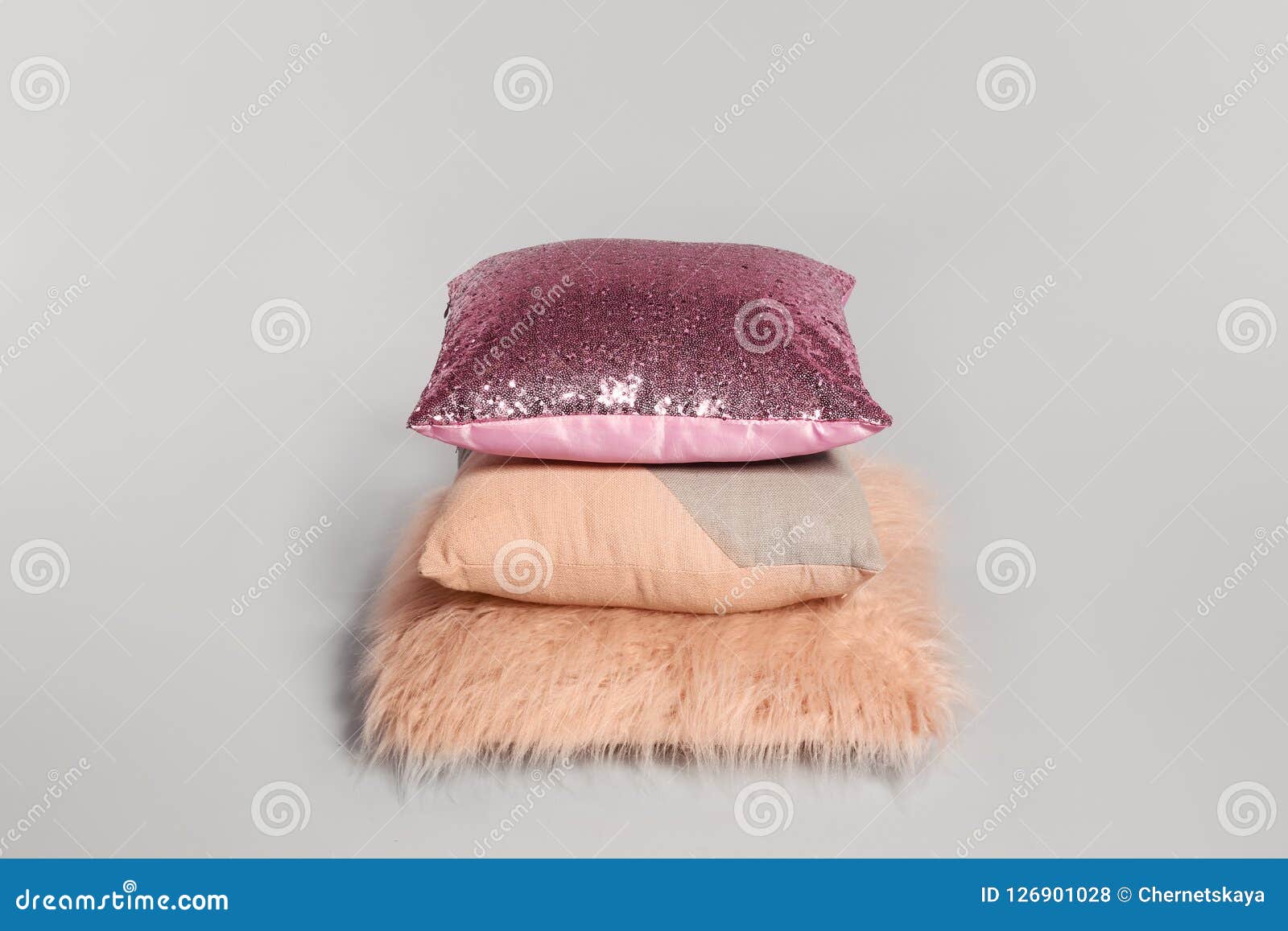 Stylish Decorative Pillows Stacked Stock Photo - Image of head, pink ...