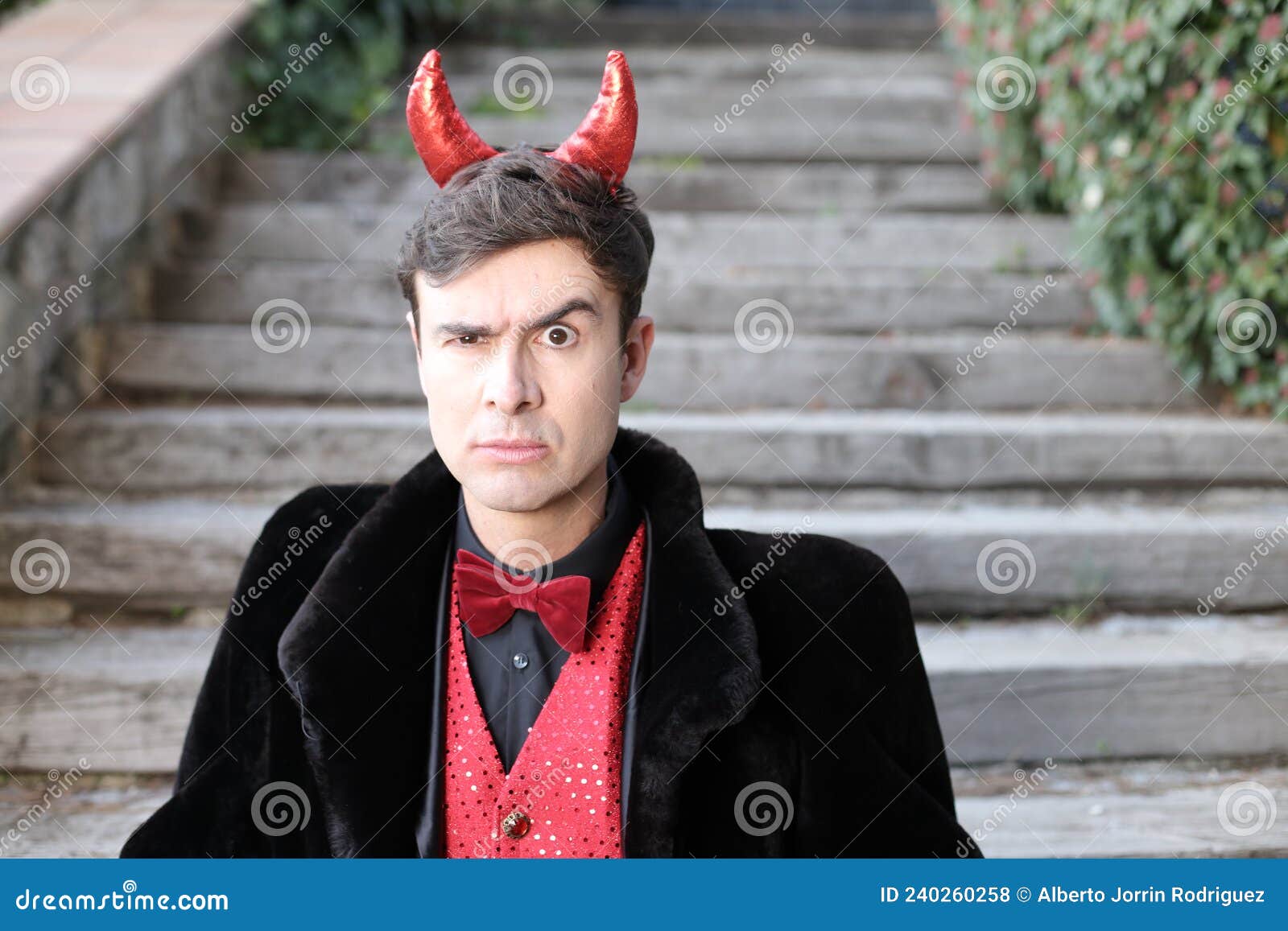 Stylish Demon Wearing Elegant Outfit Stock Photo - Image of diabolic ...