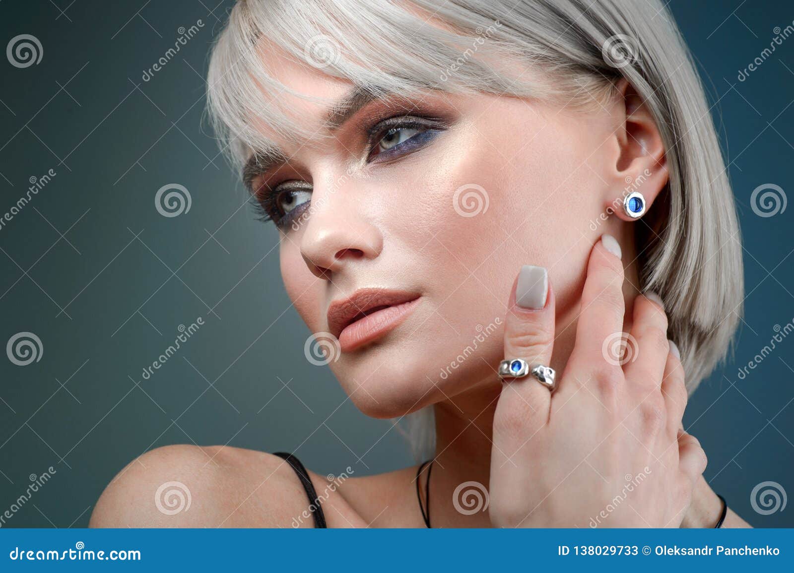 Stylish Earring on the Ear of the Model. Macro Studio Portrait of a ...