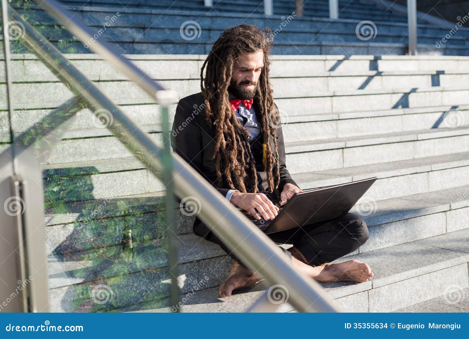 Stylish Elegant Dreadlocks Businessman Using Notebook Stock Photo ...