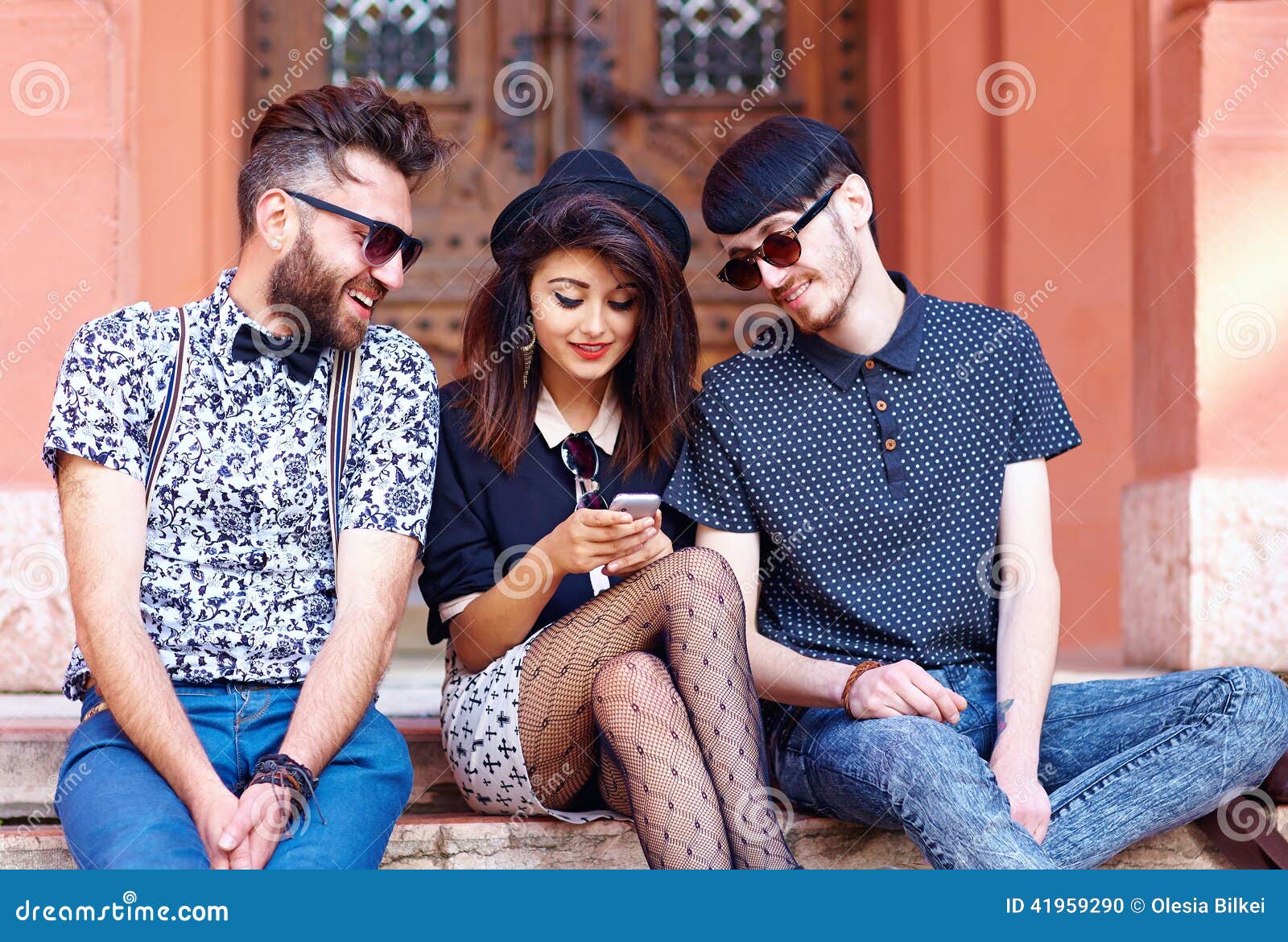 Stylish Friends Having Fun Together with the Phone Stock Photo - Image ...
