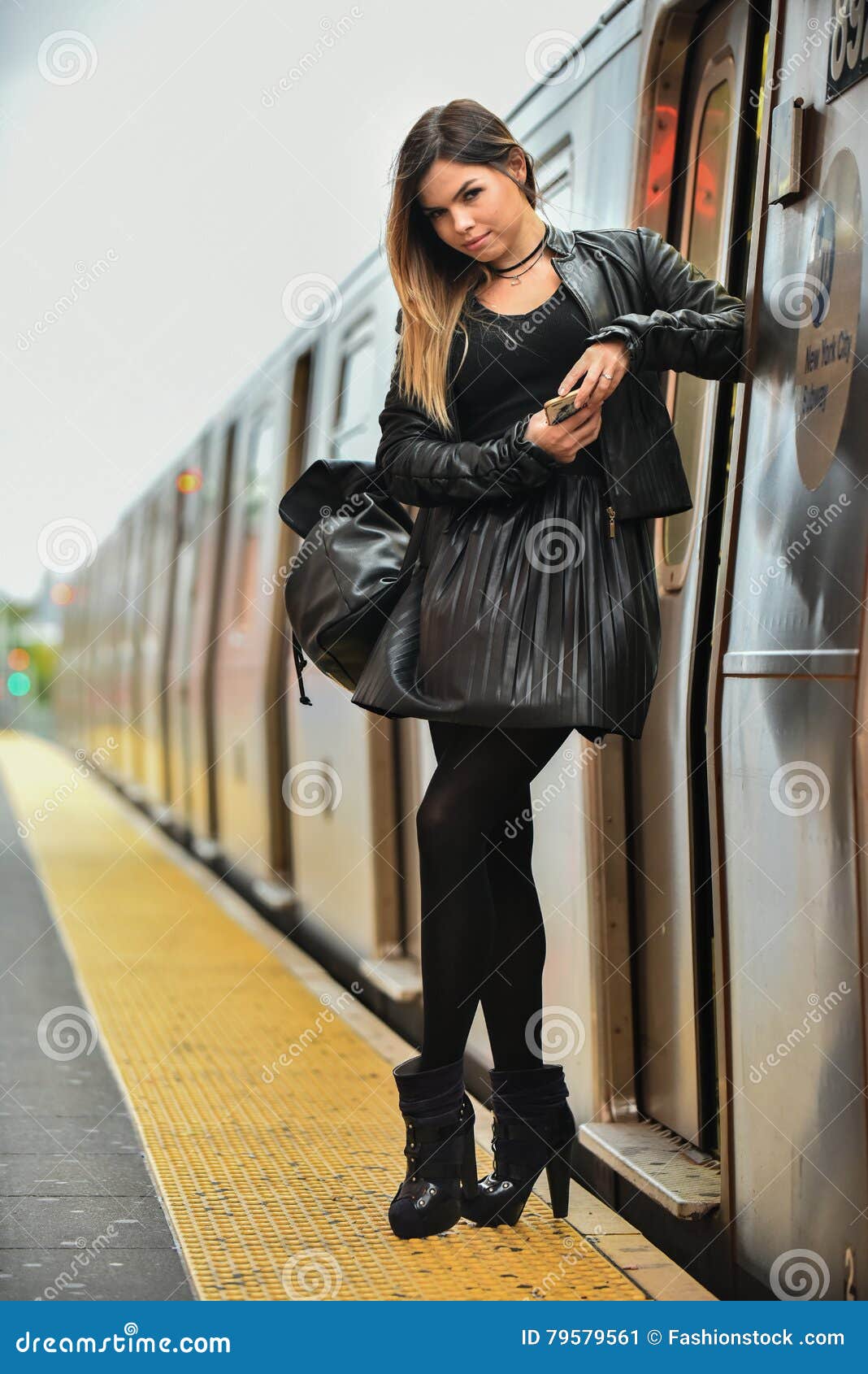 Stylish Girl Posing on the Train Platform in NYC Subway. Editorial ...