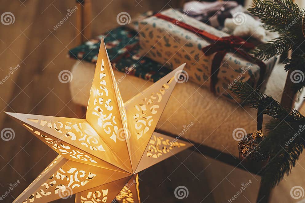 Stylish Golden Christmas Star and Christmas Gifts in Festive Wrapping ... Stylish Golden Christmas Star and Christmas Gifts in Festive Wrapping ...