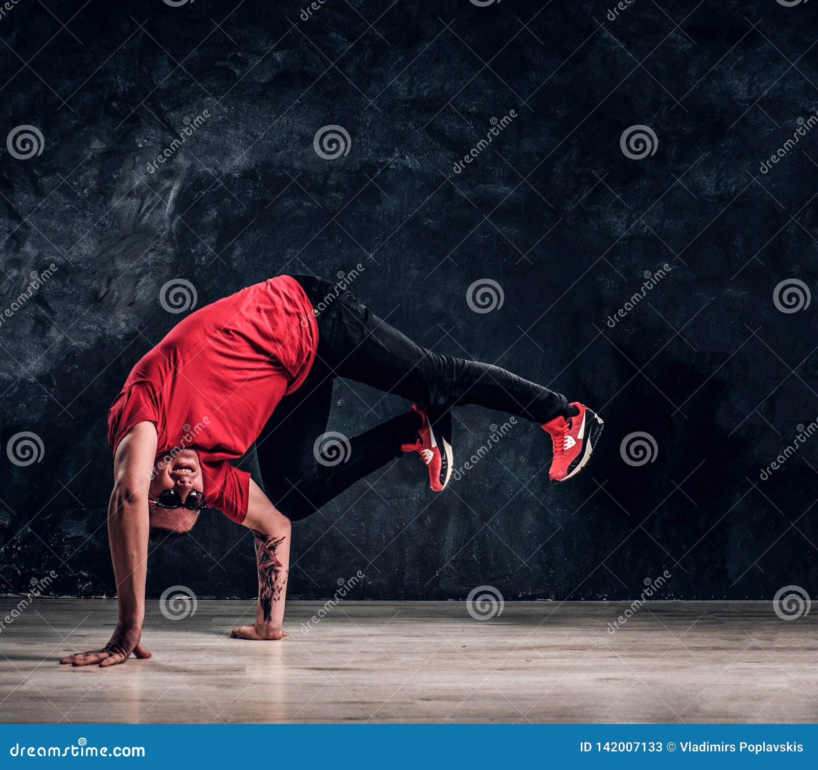 Stylish Guy Performs Breakdance Acrobatic Elements. Stock Image - Image ...