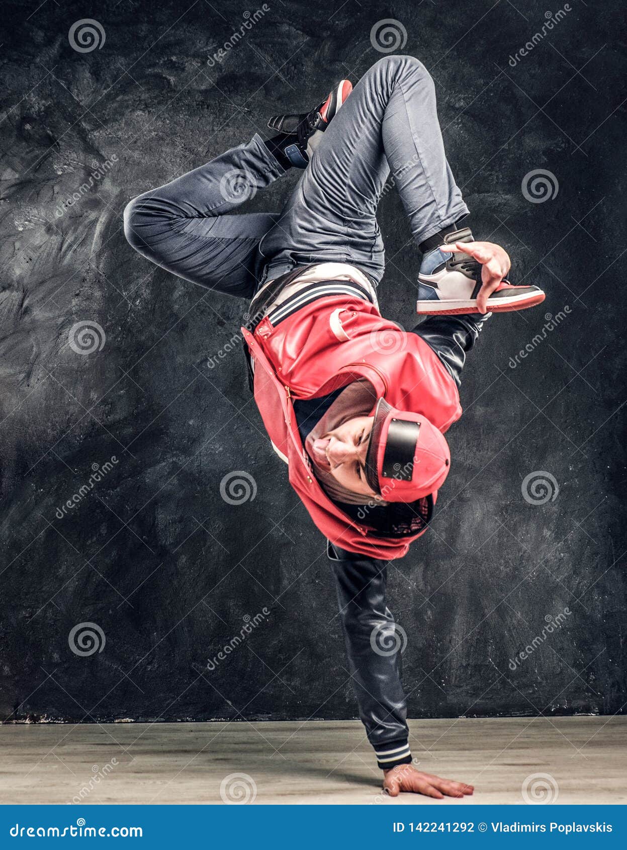 Stylish Guy Performs Breakdance Acrobatic Elements. Stock Photo - Image of cool, balance: 142241292