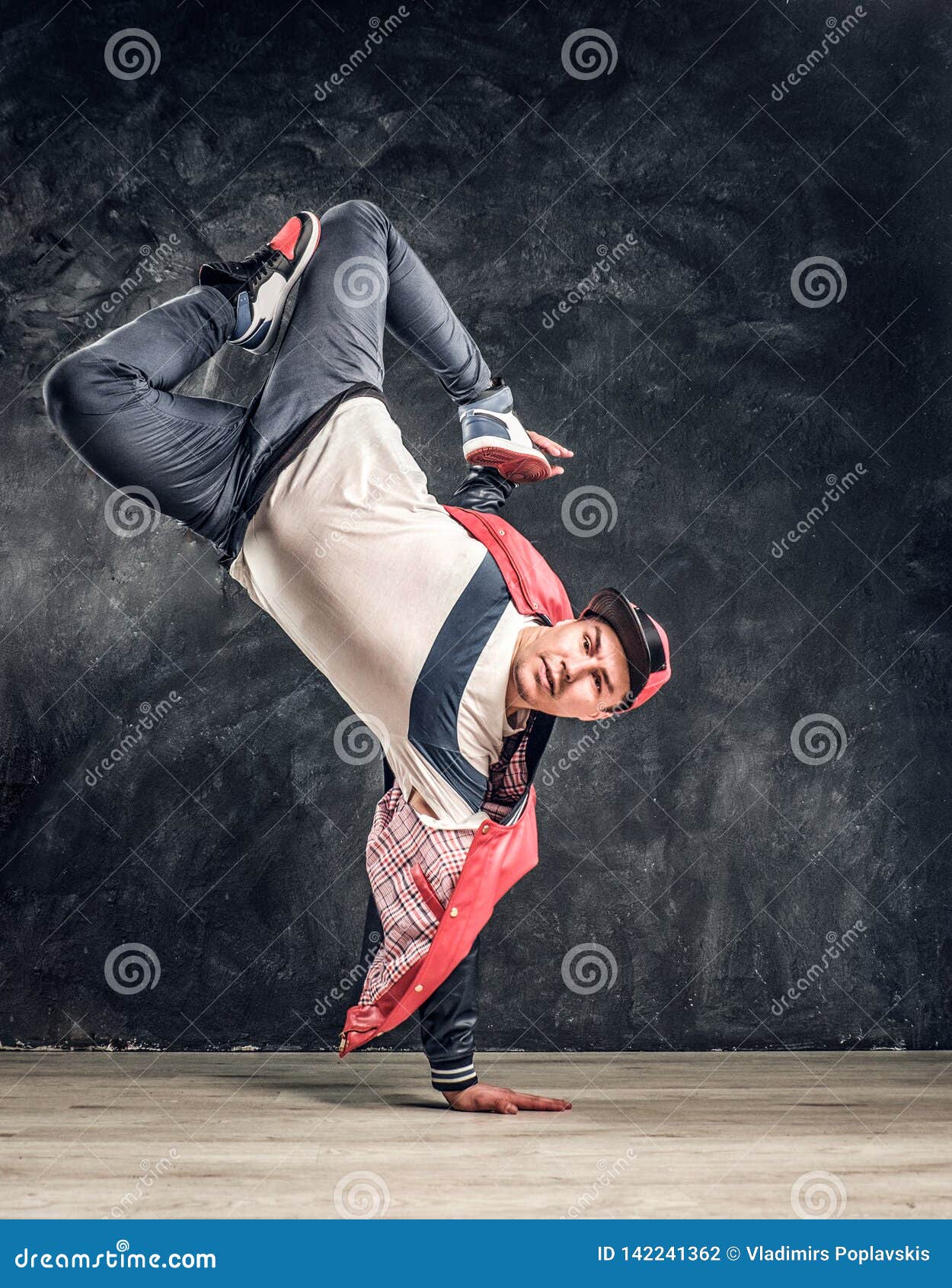 Stylish Guy Performs Breakdance Acrobatic Elements. Stock Photo - Image ...
