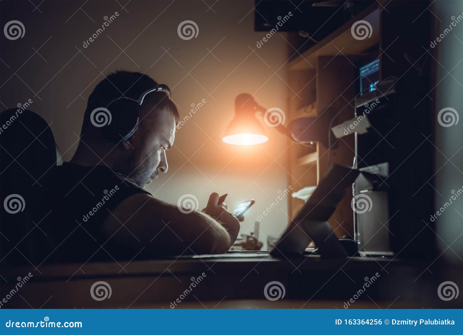 Stylish Guy Works at the Computer in the Office at Night Stock Photo ...