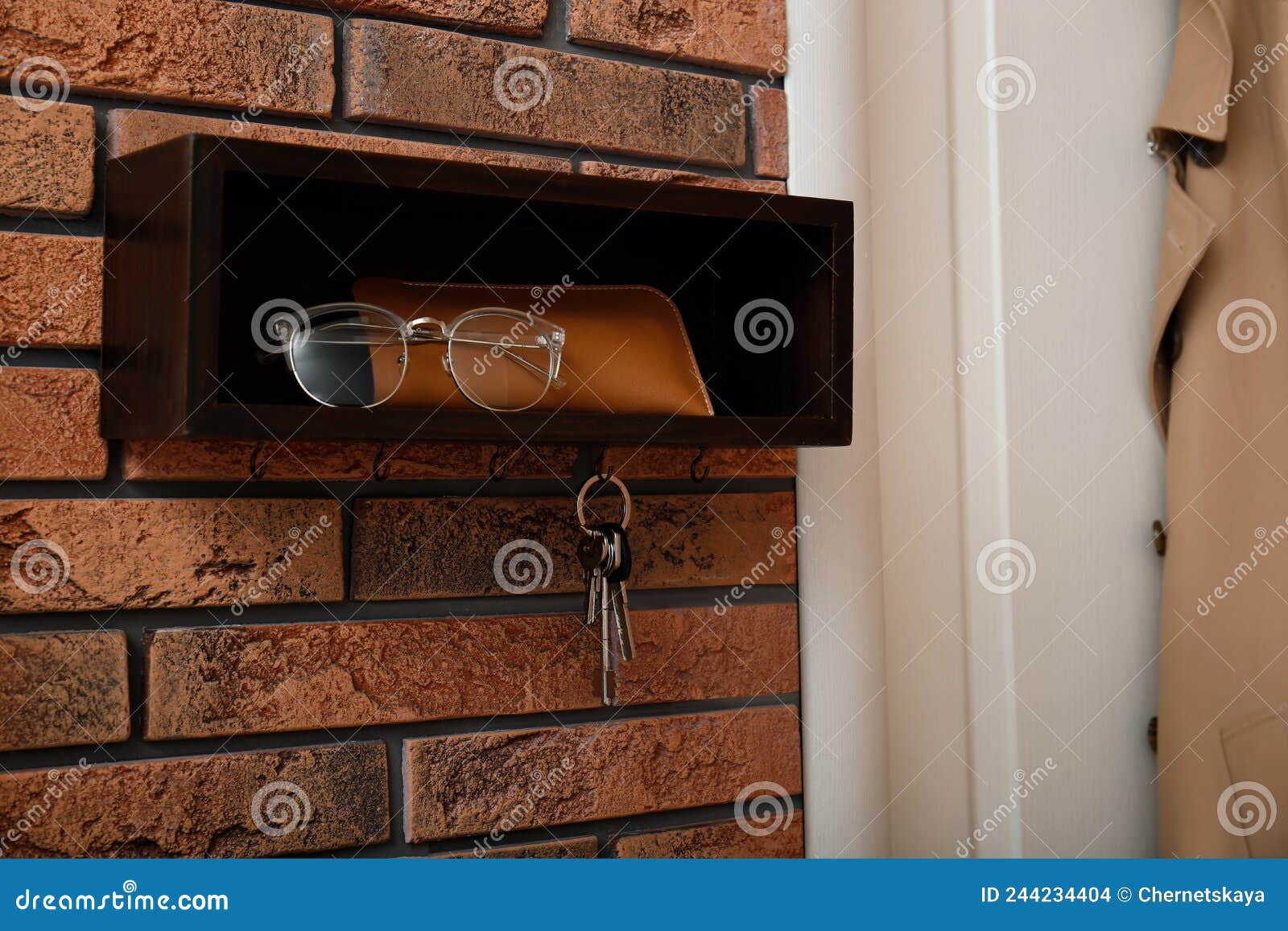 Stylish Hanger for Keys on Brick Wall in Hallway Stock Photo - Image of ...