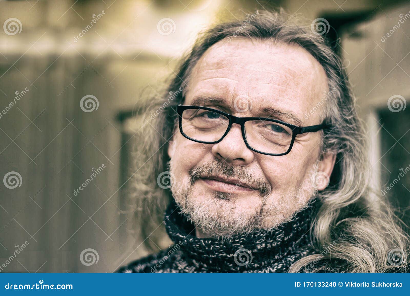 A Stylish Happy Old Man With Glasses Long Gray Hair And A Black