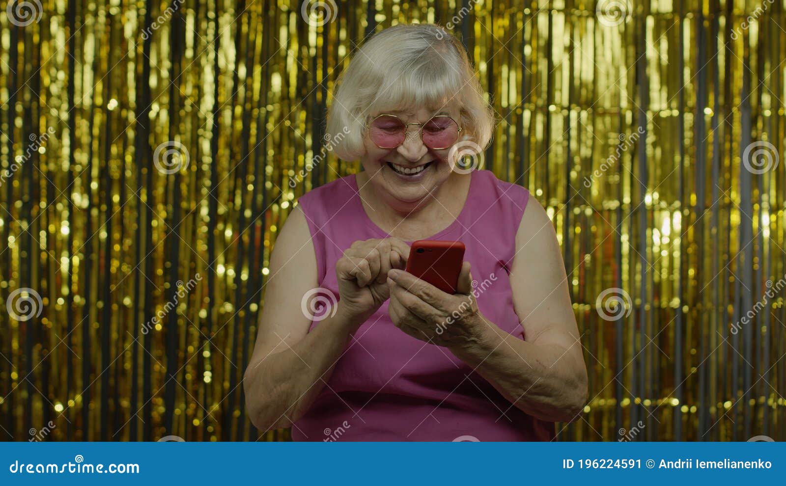 Stylish Happy Senior Old Woman Typing Message on Mobile Phone, Chatting ... Stylish Happy Senior Old Woman Typing Message on Mobile Phone, Chatting ...