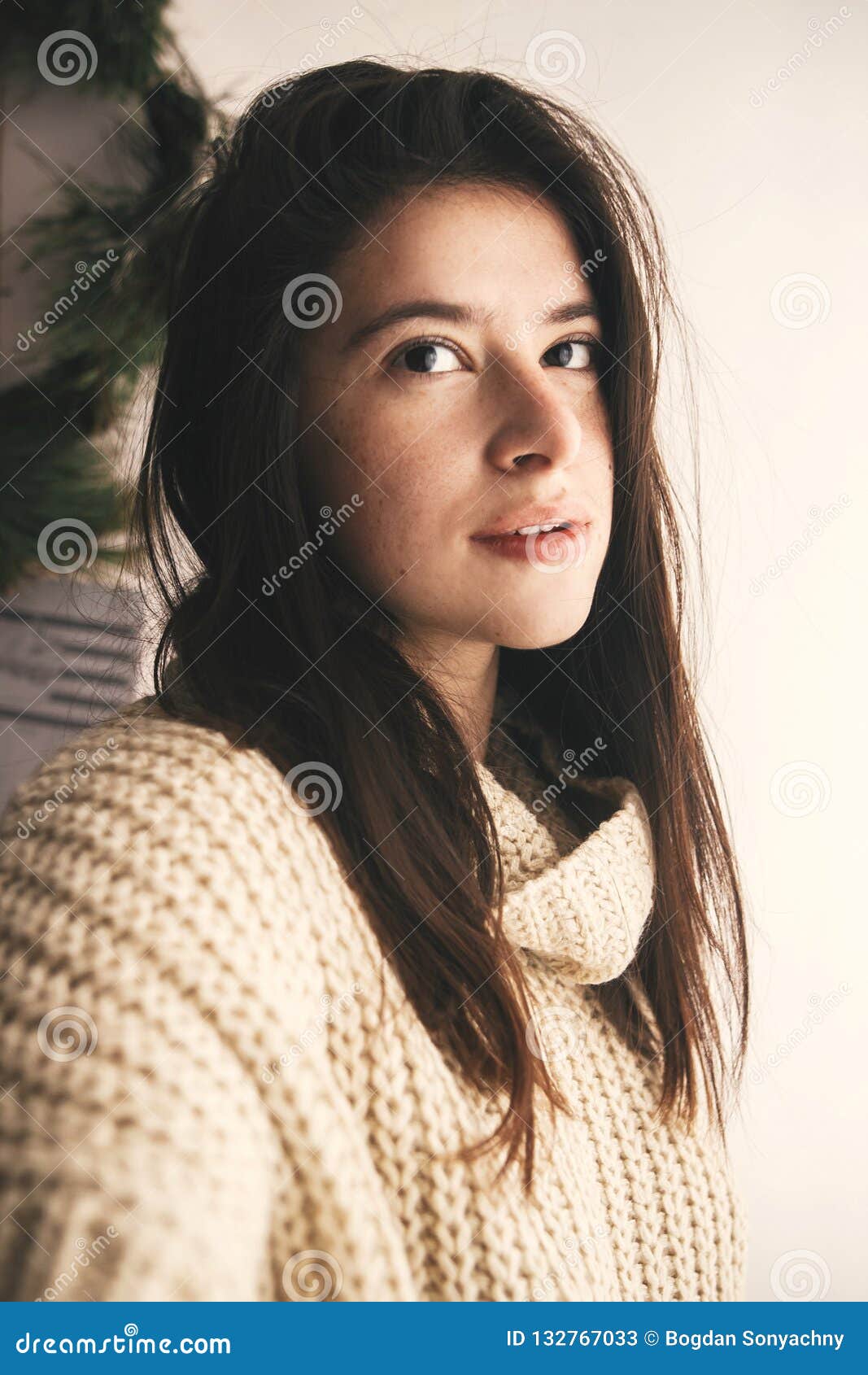 Stylish Hipster Girl in Knitted Sweater Smiling in Soft Light in Stock ... Stylish Hipster Girl in Knitted Sweater Smiling in Soft Light in Stock ...