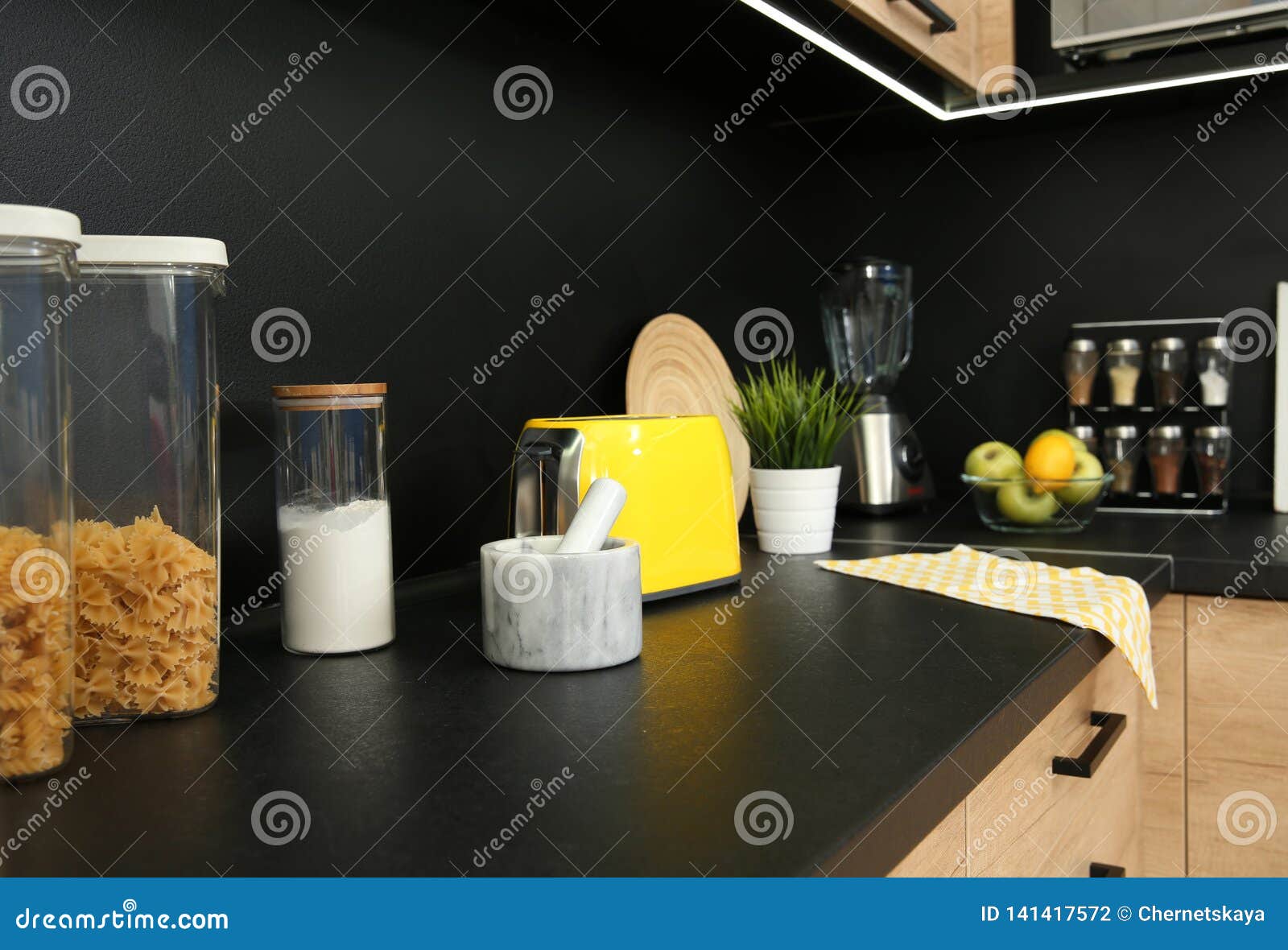 Stylish Kitchen Counter with Houseware, Appliances Stock Photo - Image ...