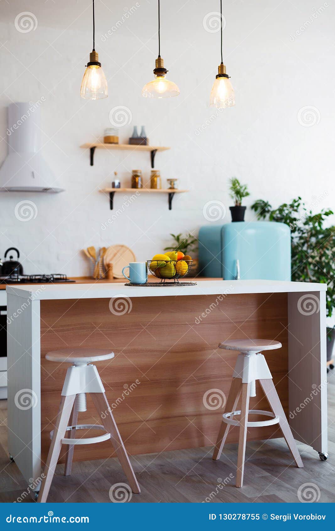 Stylish Kitchen Interior with Dining Table and Chairs Stock Image ...