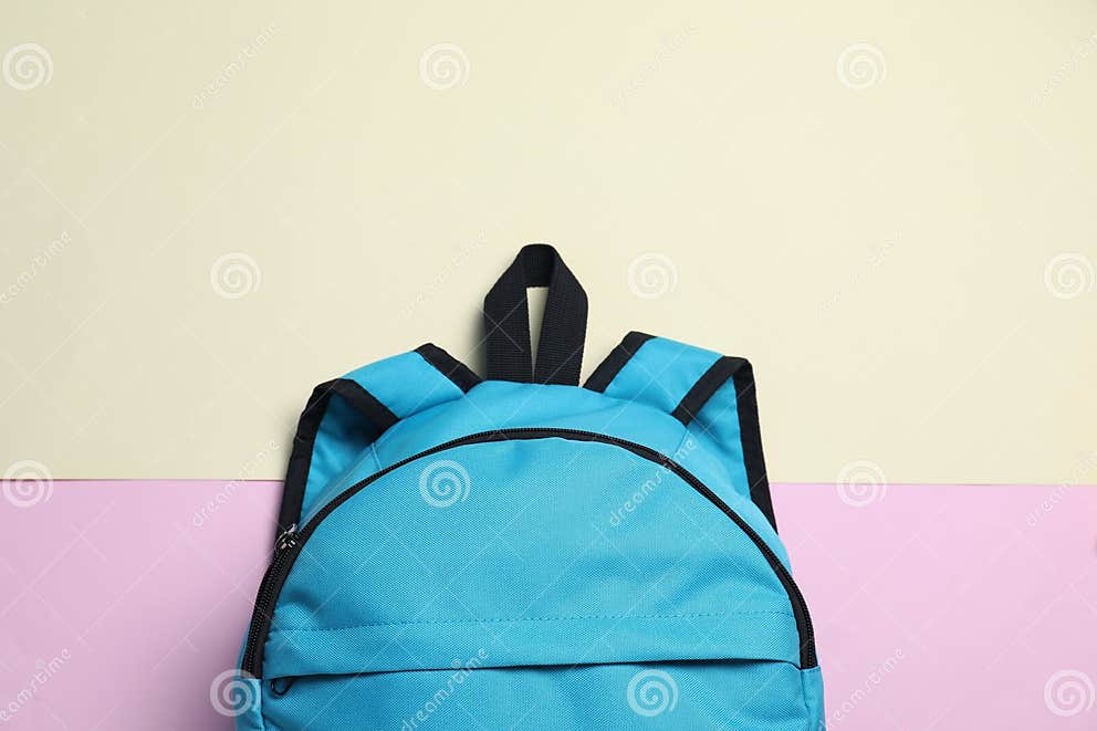 Stylish Light Blue Backpack on Color Background, Top View Stock Photo ...