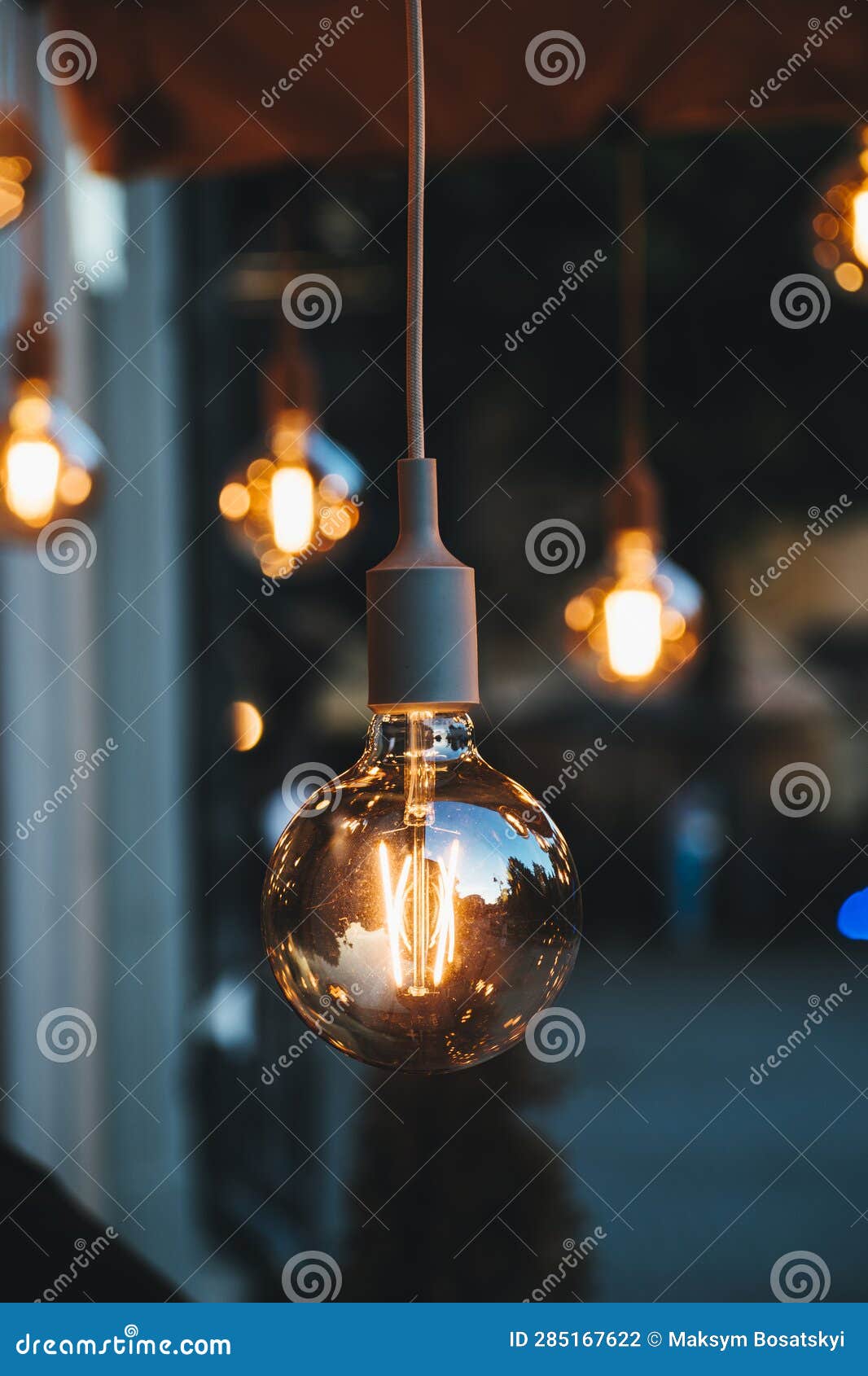 Stylish Light Bulbs in the Cafe Stock Photo - Image of glass, energy ...